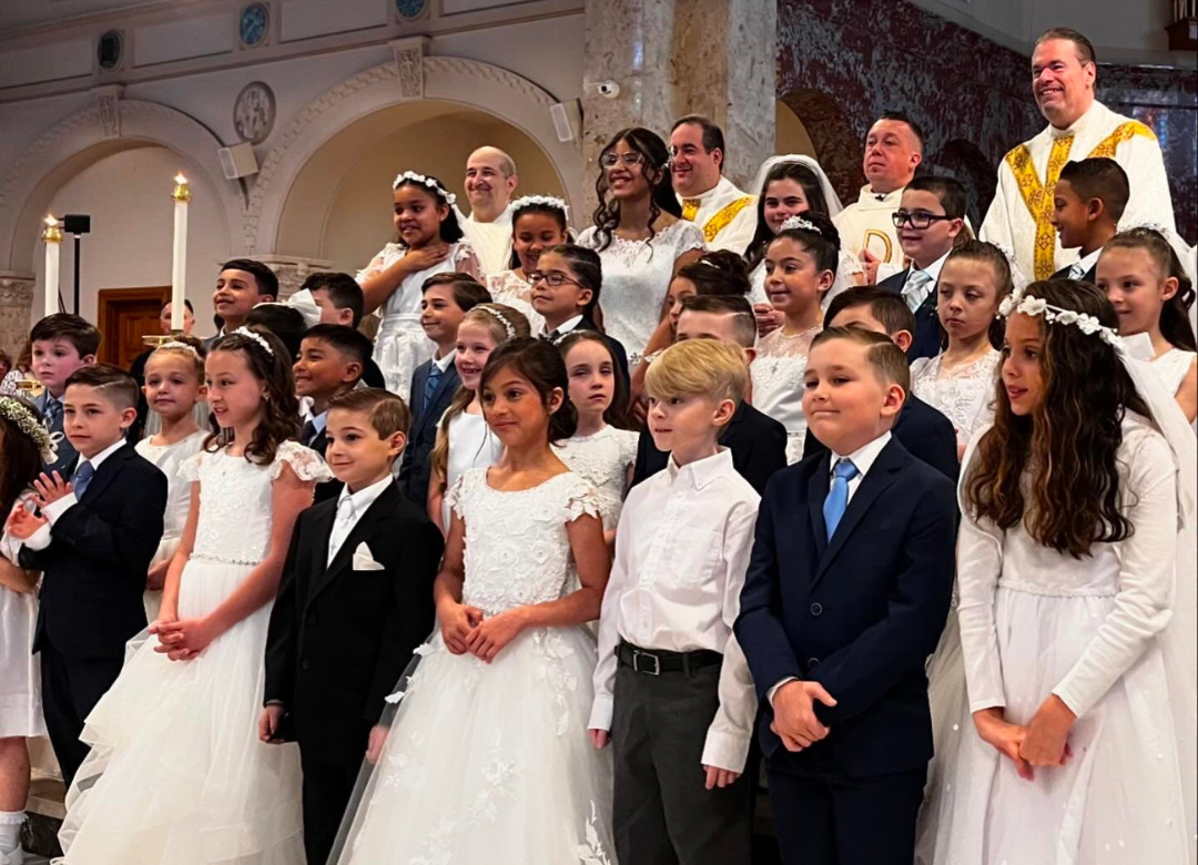 Young Catholics embrace Christ through First Holy Communion - Jersey ...
